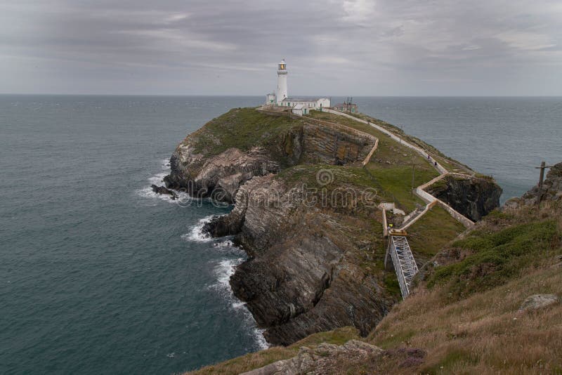 South Stack Lighthouse during the Golden Hour Stock Photo - Image of ...