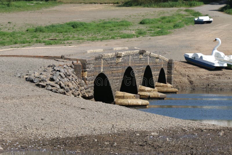 Scenic View of a Stone Bridge Going Over a River Stock Image - Image of ...