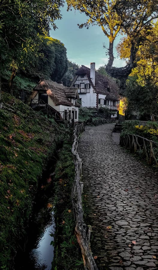 Scenic View of a Stone Paved Path with Rustic Cottages. Queimadas ...