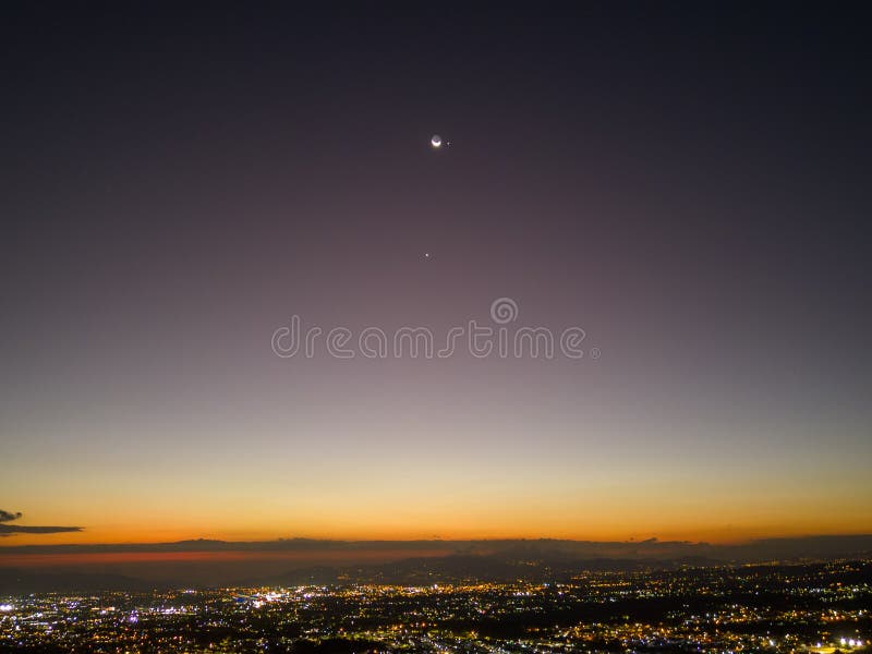 Scenic View of Sunset with Moon, Jupiter, and Venus in Conjunction ...
