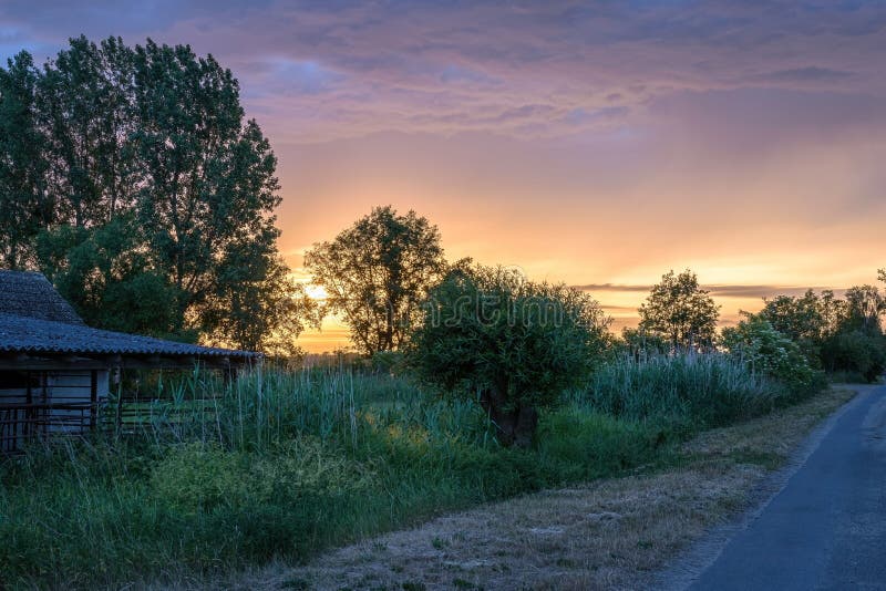 Scenic View of the Sunset Over the Fields Next To the Road in Dromling ...