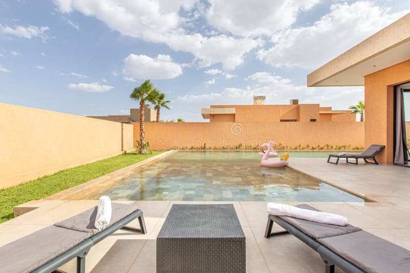 Scenic View of a Swimming Pool Inside a Mansion on a Sunny Day ...