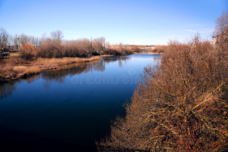 Scenic View of the Tormes River with Reflection of Plants and Trees ...