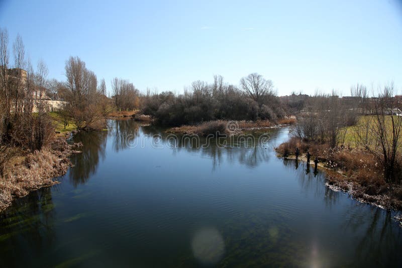 Scenic View of the Tormes River with Reflection of Plants and Trees ...