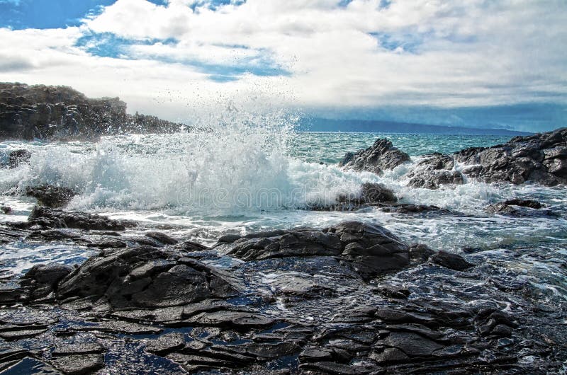 Scenic View of a Wavy Sea Hitting the Rocky Beach Stock Photo - Image ... Scenic View of a Wavy Sea Hitting the Rocky Beach Stock Photo - Image ...