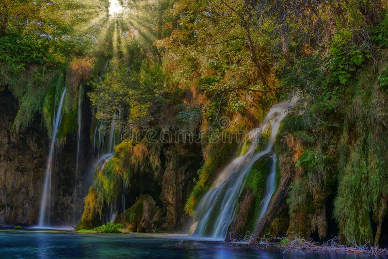 Scenic Waterfall in the Forest on a Sunny Day Stock Photo - Image of ...