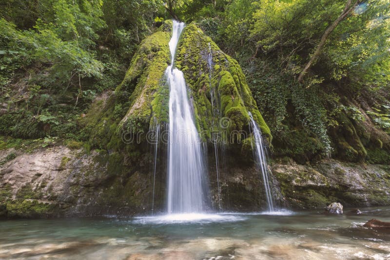 Scenic waterfall by summer stock image. Image of flow - 265420451