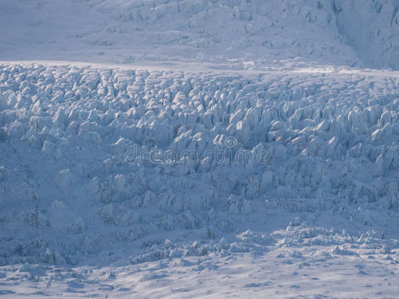 Scenic Winter Landscape Featuring a Snow-covered Hillside with a Slick ...