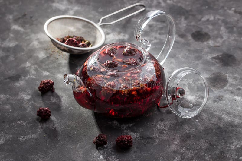 Scented Red Tea in Transparent Teapot on the Table Stock Photo - Image ...