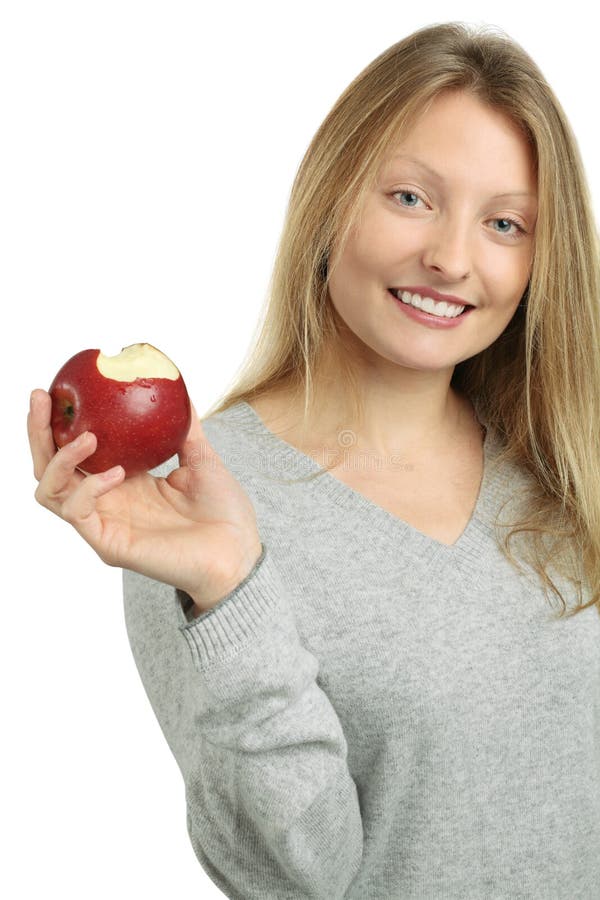Frau, die einen Apfel isst stockfoto. Bild von frisch - 18300776