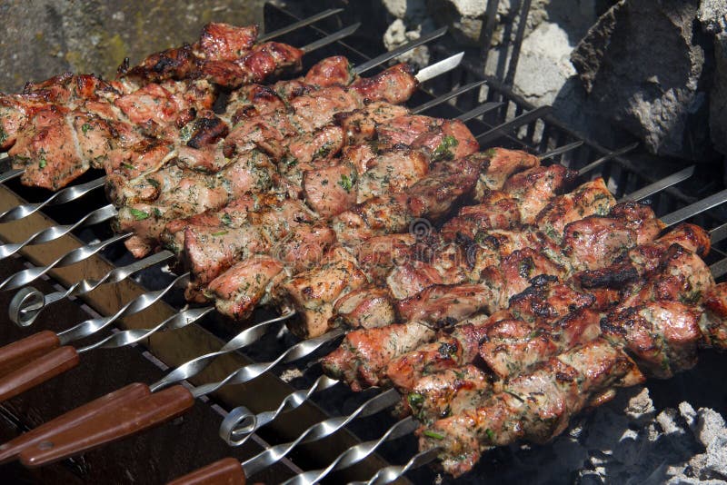 Traditional Russian Barbecue Lamb Shashlik Skewer with Tomatoes and ...