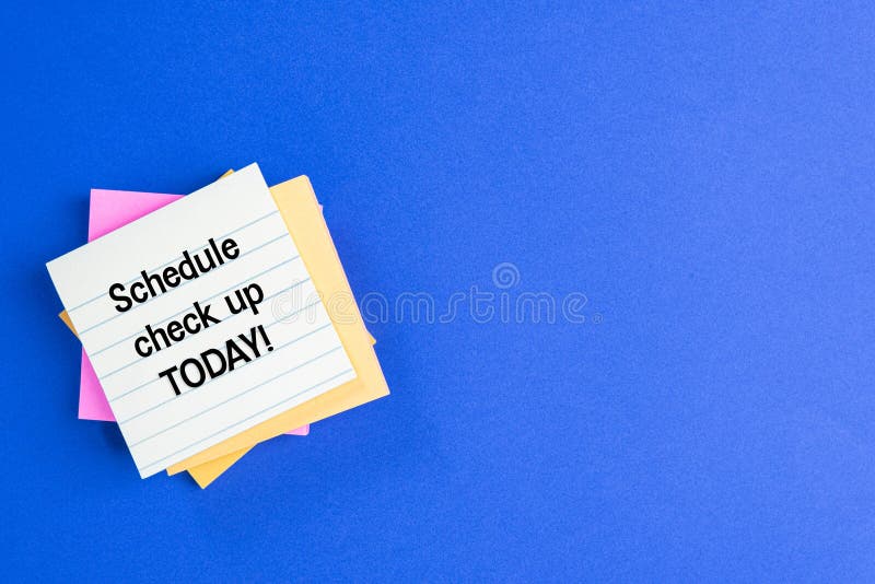 Schedule Check Up Today Message Text on a Lined, Yellow Paper Notepad ...