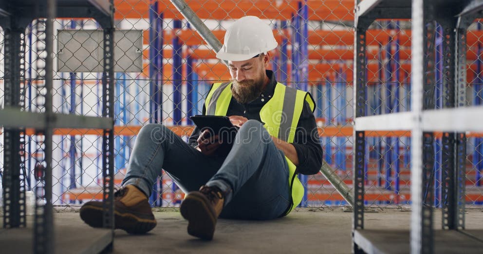 Schedule, Storage and Tablet with Construction Worker Man in Warehouse ...