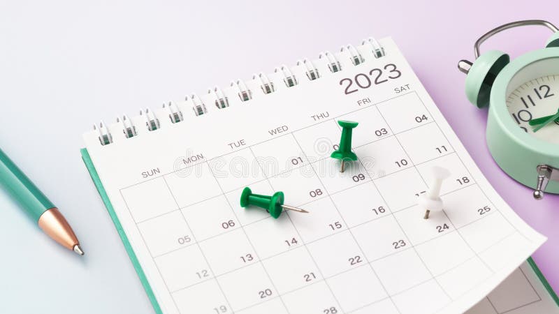 Scheduling and Planning Concept, Calendar with Green Pin, Pen and Clock ...