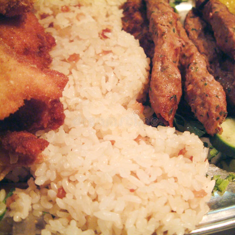 Schnitzel and rice closeup stock photo. Image of dish - 109533164