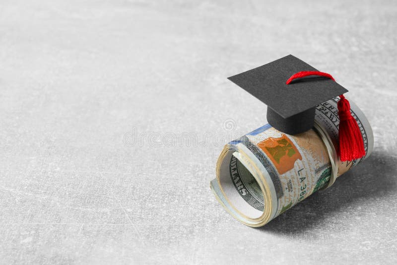 Scholarship Concept. Graduation Cap and Banknotes on Light Grey Table ...