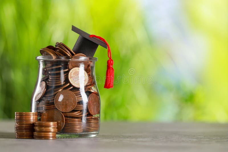 Scholarship Concept. Graduation Cap and Jar with Coins on Grey Table ...
