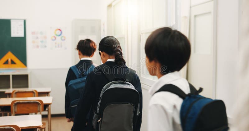 School, Backpack and Kids Walking in Classroom for Education ...