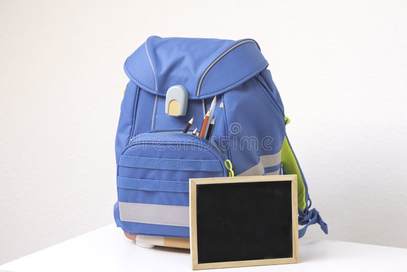 School Backpack on the Table. Preparation for School Stock Image ...