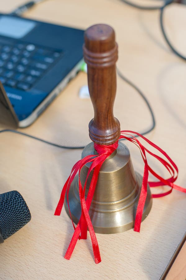 The School Bell on the Table with Red Ribbons Stock Photo - Image of ...