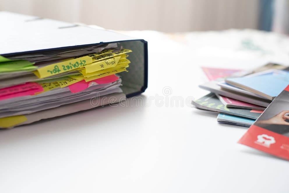 School Box-files with Organized Reading Document Notes on Table. Office ...