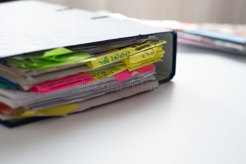 School Box-files with Organized Reading Document Notes on Table. Office ...