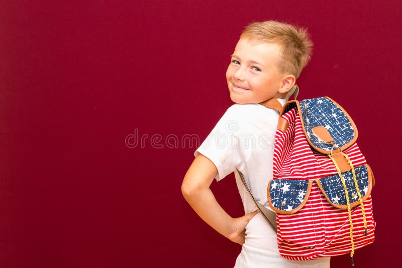 School Boy with Backpack, on Red Wall Stock Photo - Image of elementary ...