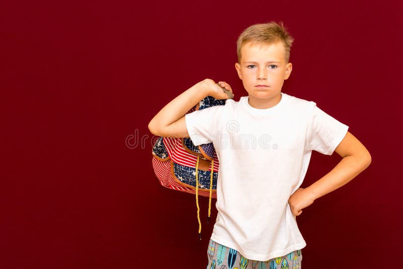 School Boy with Backpack, on Red Wall Stock Image - Image of looking ...