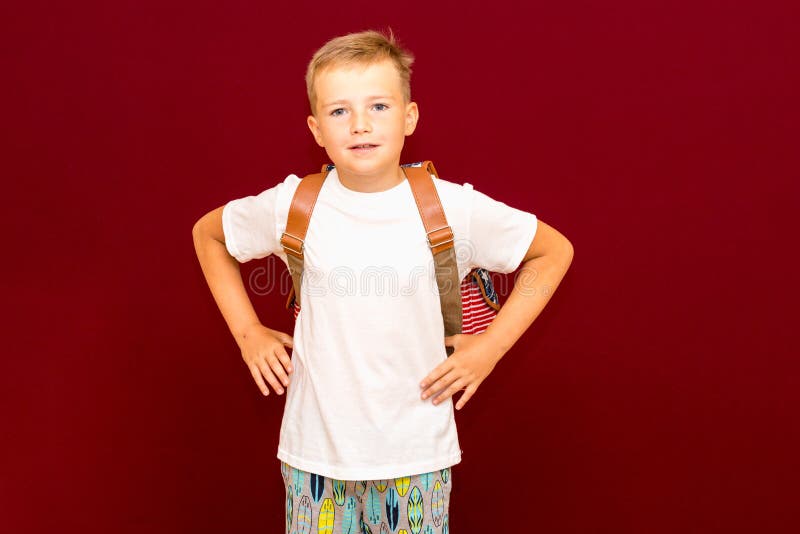 School Boy with Backpack, on Red Wall Stock Photo - Image of ground ...