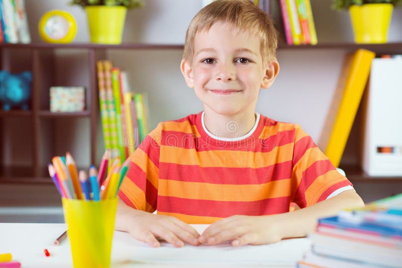 School Boy at Classroom Desk Making Schoolwork Stock Photo - Image of ...