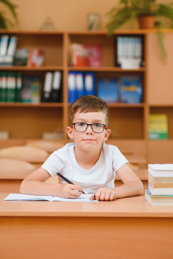 School Boy in Classroom at Lesson Stock Image - Image of classroom ...