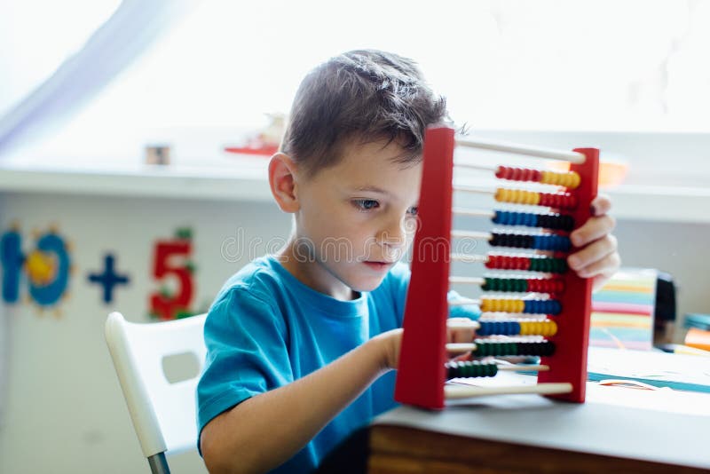 School Boy Learning Maths with an Abacus Stock Image - Image of math ...