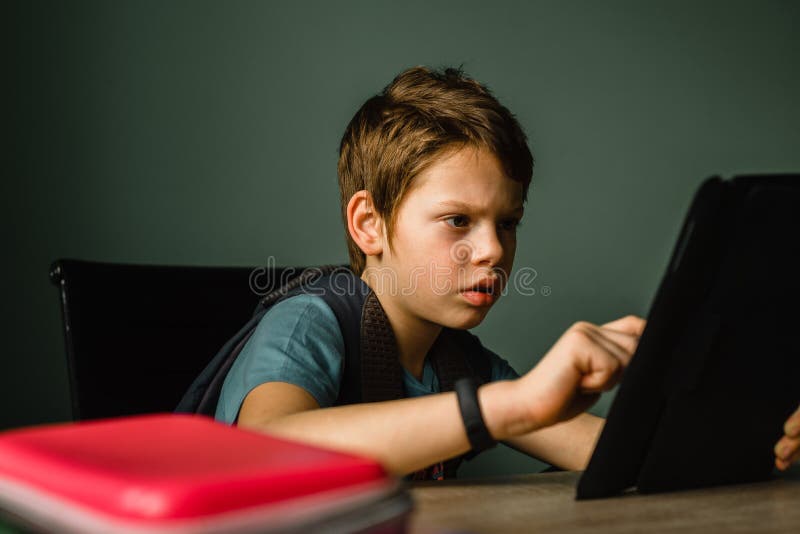 School Boy Playing Tablet at Home, Growing Up with Technology Stock ...