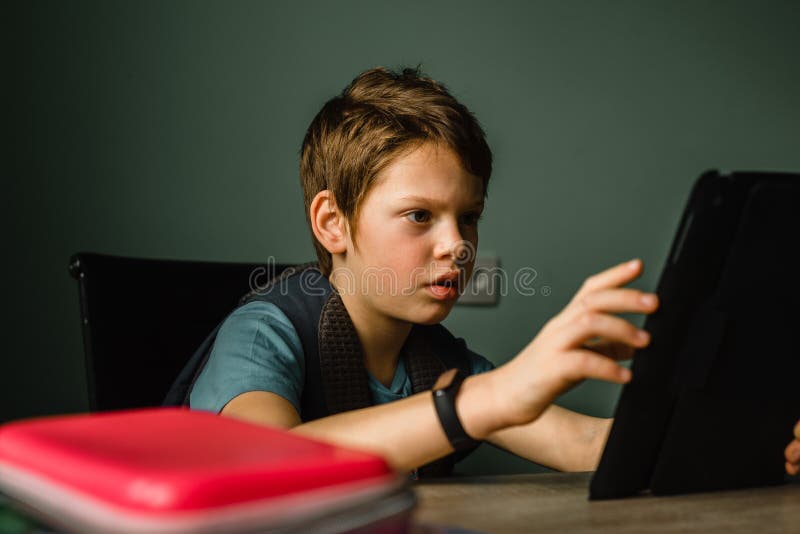 School Boy Playing Tablet at Home, Growing Up with Technology Stock ...
