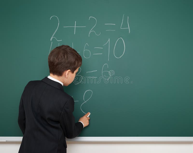 School Boy Solve Math on School Board Stock Photo - Image of desk ...
