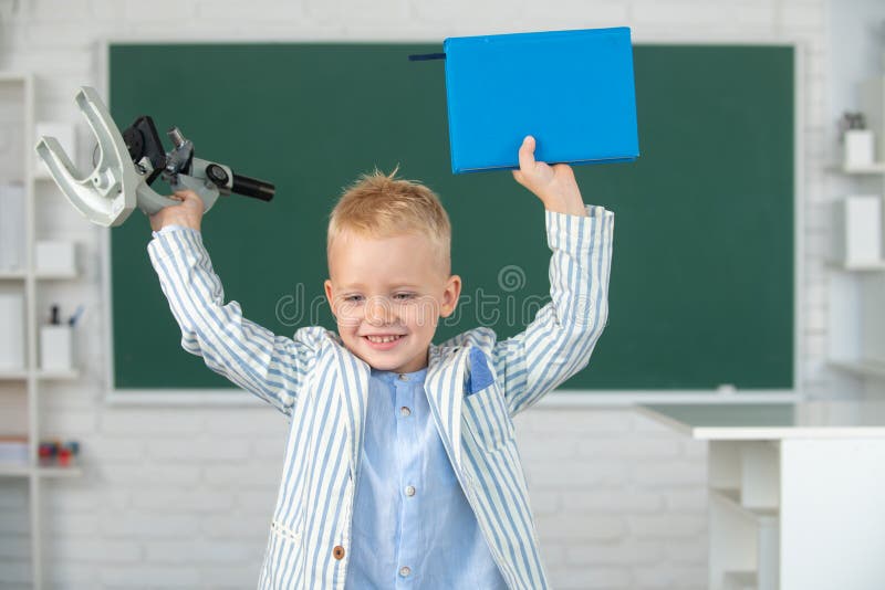 School Boy Studying Math on Lesson in Classroom at Elementary School ...