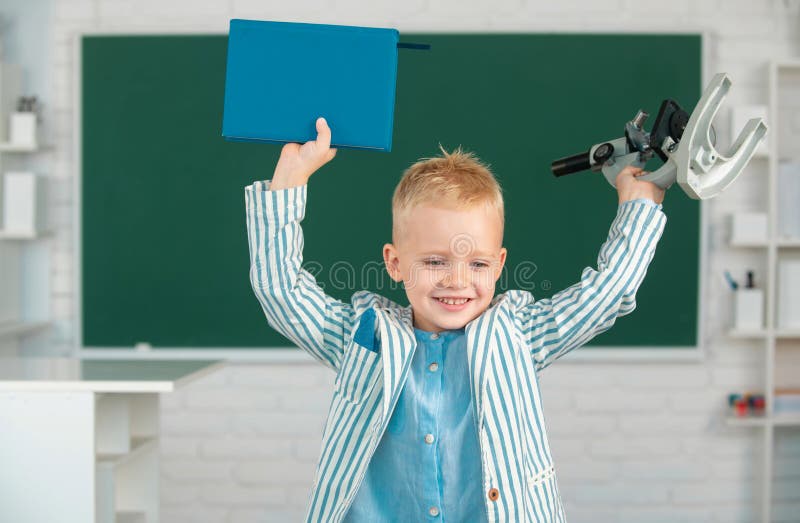 School Boy Studying Math on Lesson in Classroom at Elementary School ...