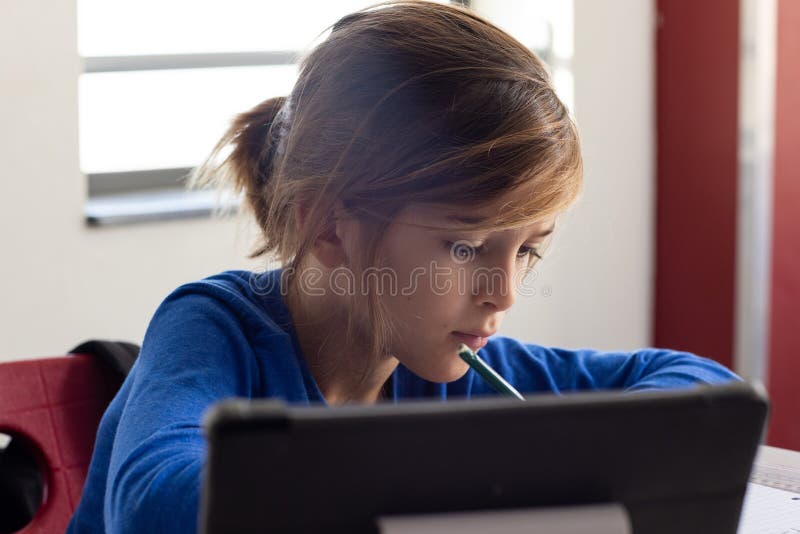 In School, Boy Studying with Tablet and Pencil, Concentrating on Work Stock Image - Image of ...