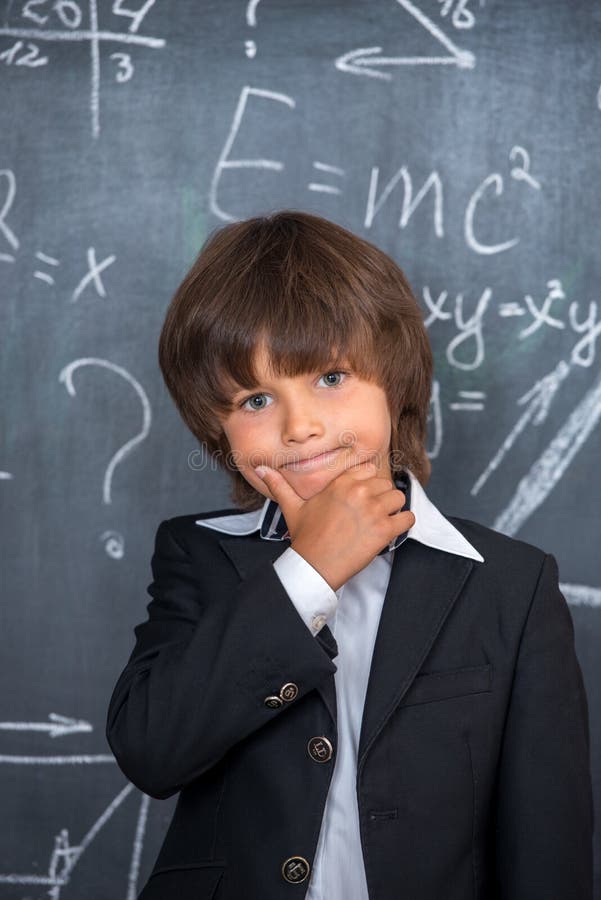 School Boy Trying To Solve Equations Stock Photo - Image of learning ...