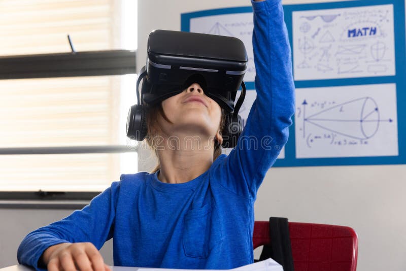 In School, Boy Using VR Headset for Interactive Learning in Classroom ...