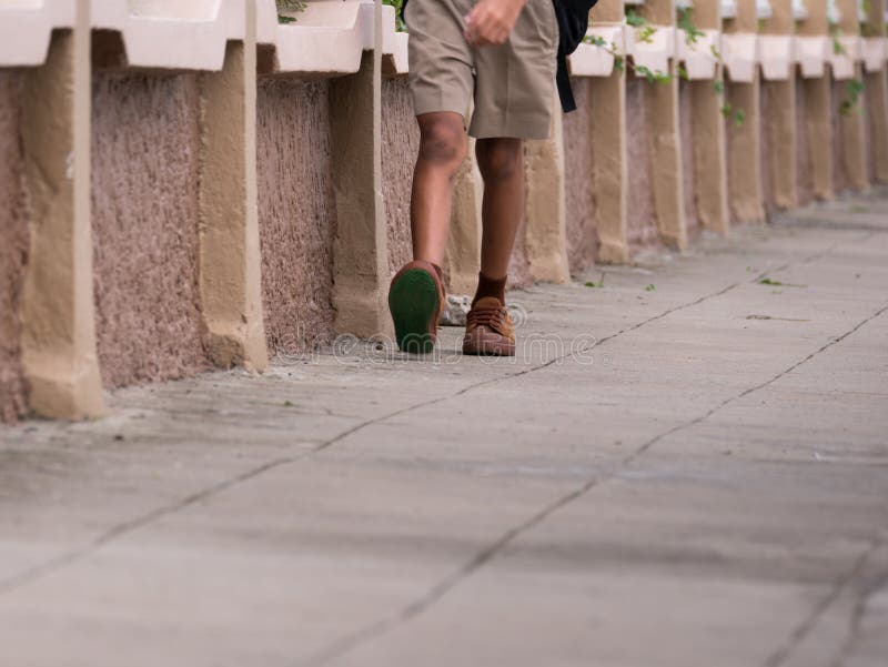 School Boy Walking on the Footpath Stock Image - Image of sidewalk ...