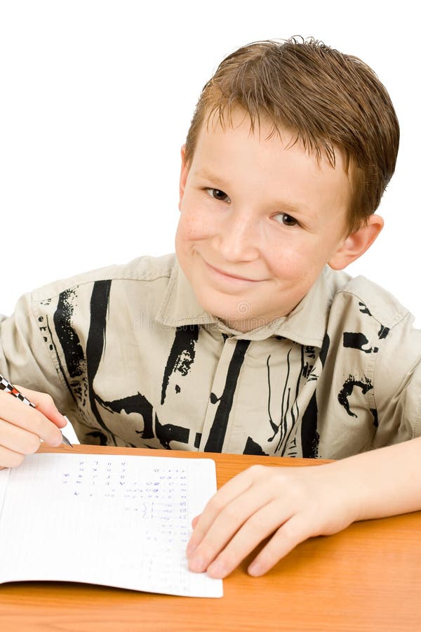 School boy writing stock photo. Image of schoolboy, sitting - 9569526