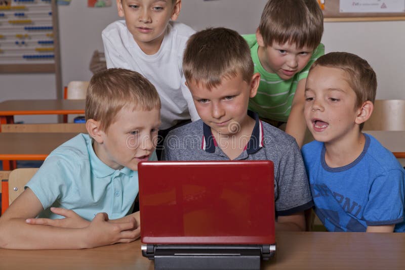 School boys with laptop stock image. Image of environment - 56690149