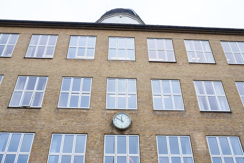 School Building with a Clock on the Building Stock Image - Image of ...
