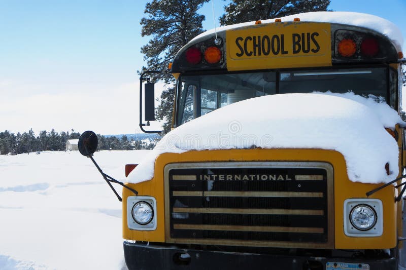 School bus covered in snow editorial photography. Image of school ...