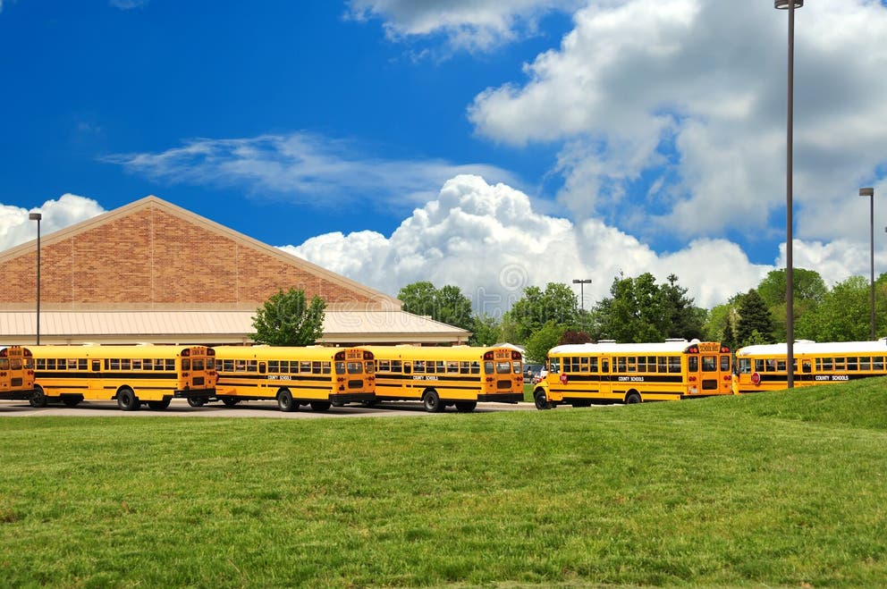 School Bus Lineup in Spring Stock Photo - Image of elementary, line ...