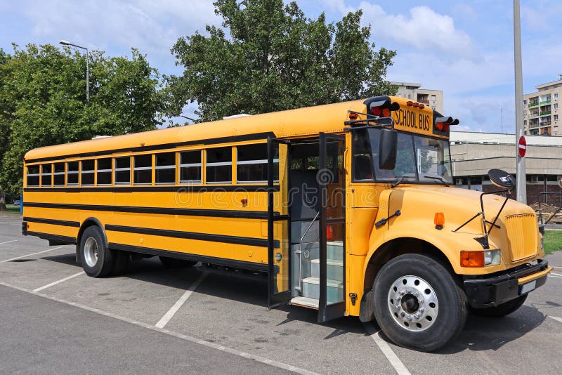 School Bus in the Parking Lot Stock Image - Image of transport, vehicle ...