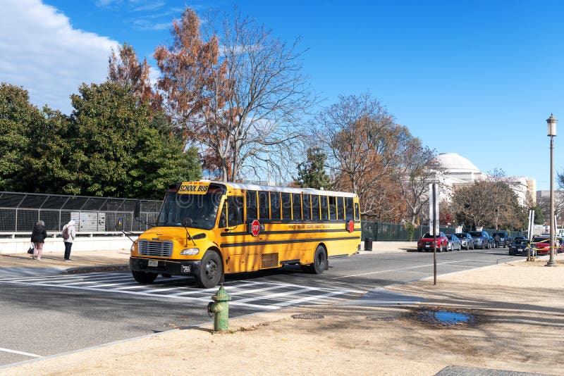 School Bus Rides on the City Road in Central Washington DC Editorial ...