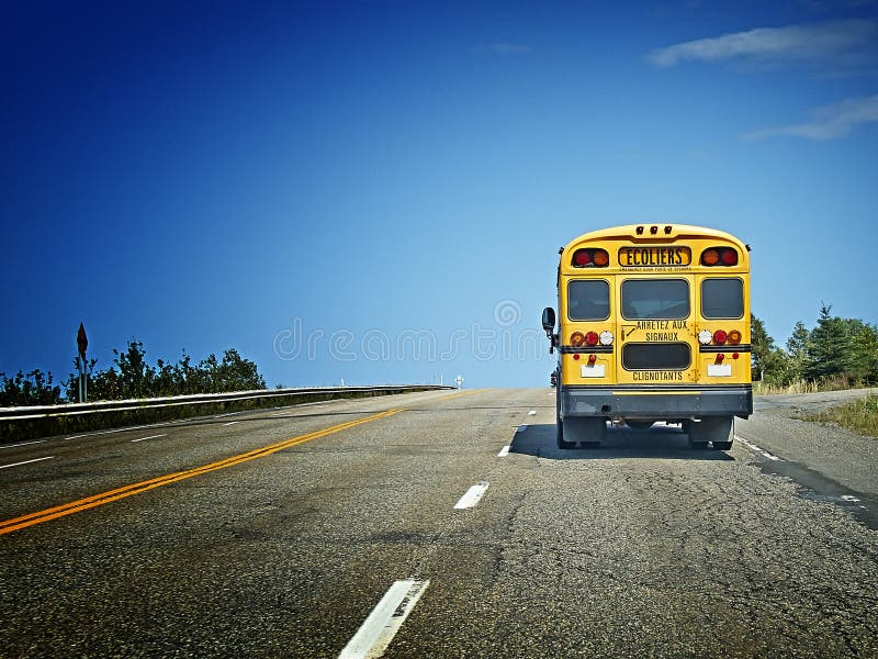 School Bus on the Road from Behind Stock Image - Image of america, home ...