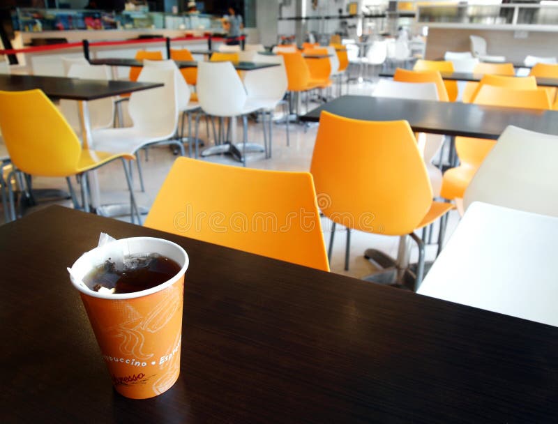 School Cafeteria Table with Cup of Tea Stock Image - Image of cafeteria ...